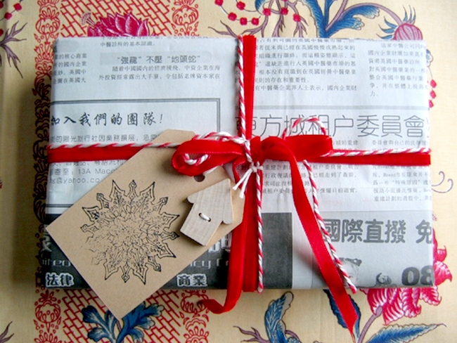 25 Newspaper Gift Wrapping Ideas • One Brick At A Time